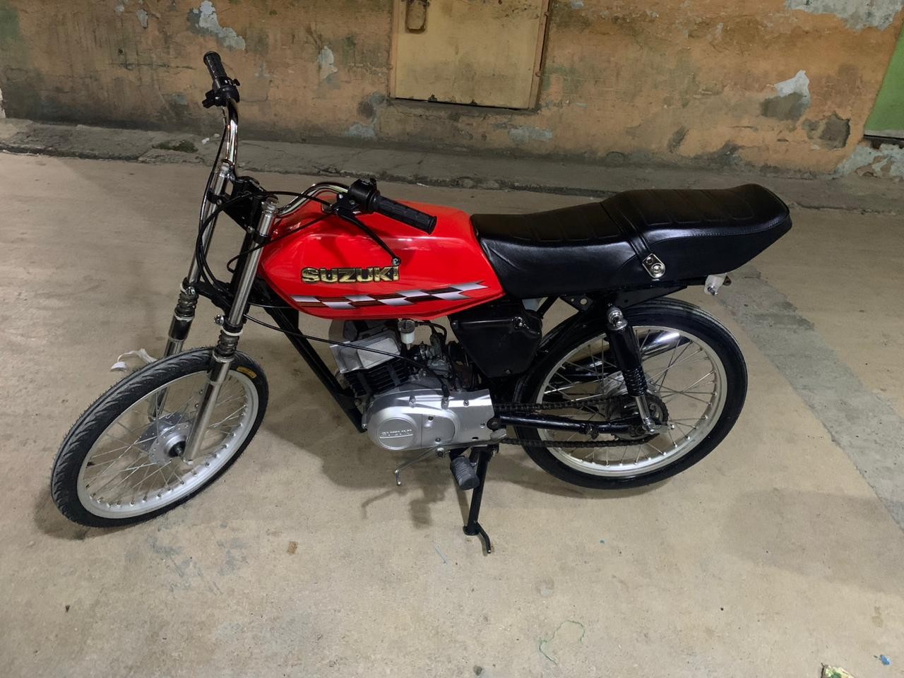 Corotos | Suzuki. AX 100. En buenas condiciones